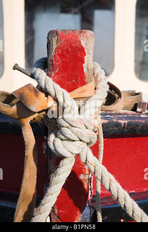 Old fishing boat rope with a Tied Knot on gray background Stock Photo ...