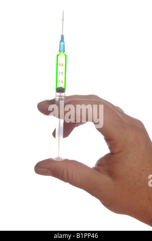 a hand holding an hyperdermic needle Stock Photo - Alamy