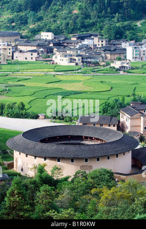 A rooftop view of Fujian tulou tourist attraction in Fujian, China ...