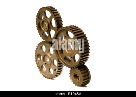 four cogwheels isolated on white Stock Photo - Alamy