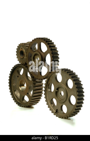 four cogwheels isolated on white Stock Photo - Alamy
