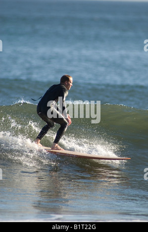 Longboarders Surfing Langland Bay Gower Stock Photo - Alamy