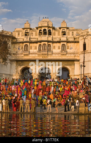 Rajasthani women gather at the GANGAUR GHAT on the shore of PICHOLA ...