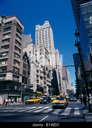 People walk along 5th Avenue in midtown Manhattan, New York City Stock ...