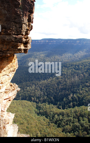 A high vantage point overlooking a valley with the horizon in the ...