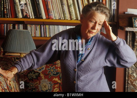elderly woman feeling dizzy Stock Photo - Alamy