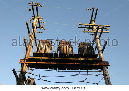 Electricity transformer on two wooden poles Stock Photo: 52721537 - Alamy