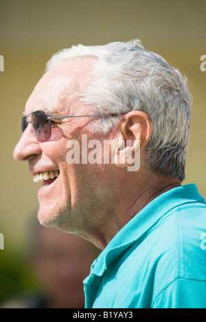 Side profile of a senior man smiling Stock Photo - Alamy