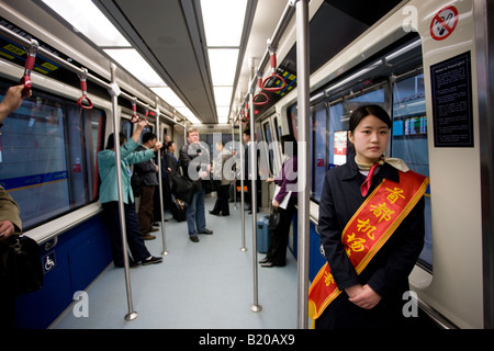 Passenger shuttle train in terminal at modern Hamad International ...