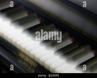 Piano keys in motion Stock Photo - Alamy