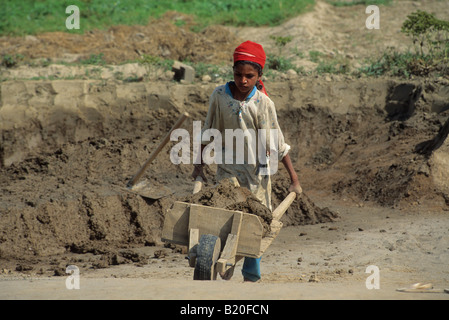 Child labor in brick factory Stock Photo - Alamy