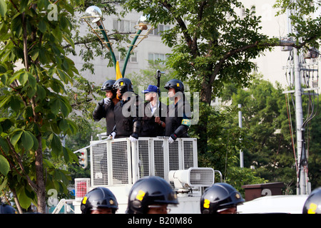Japanese Police officers wearing riot gear at the G8 summit in Sapporo ...