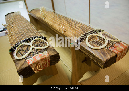 The Koto is a traditional Japanese stringed instrument with a long ...