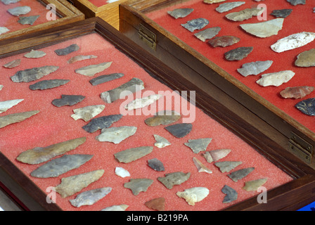 Ancient stone arrowheads in display case Stock Photo - Alamy
