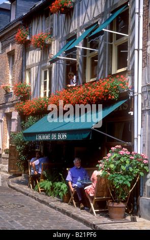 Quaint restaurant in the old channel port of Honfleur Stock Photo - Alamy