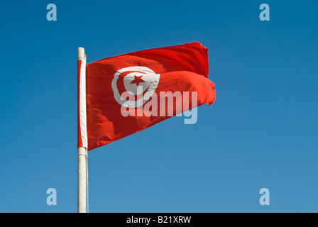 Tunisian flag. Crescent moon and star on a red background Stock Photo ...