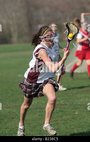 girls playing a high school lacrosse game Stock Photo - Alamy