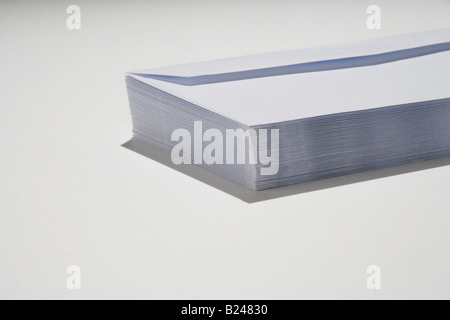 A stack of white envelopes for background Stock Photo - Alamy
