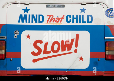 Danger mind that child ice cream slogan sign Stock Photo - Alamy