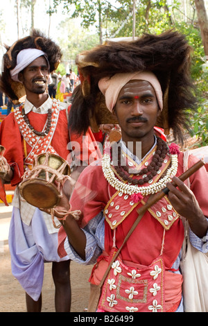 Members of the Jenu Kuruba tribal group of south India. They wear ...