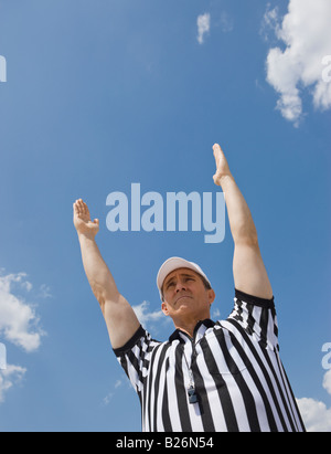 Male football referee making touchdown call Stock Photo - Alamy