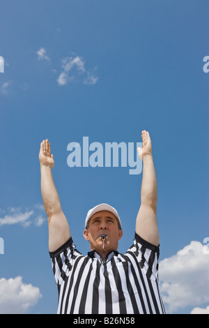 Male football referee making touchdown call Stock Photo - Alamy