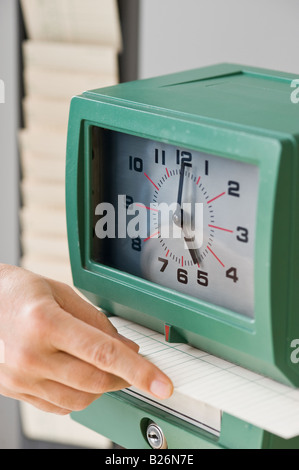 Punching The Clock Stock Photo Alamy