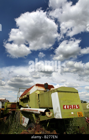 The old Claas combine harvester in the middle of an agricultural field ...