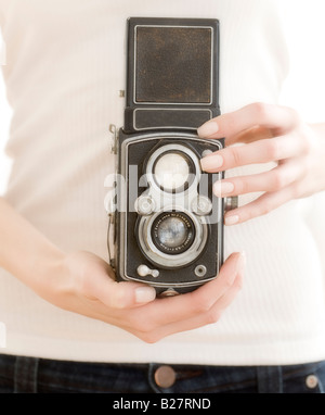Woman with vintage camera Stock Photo - Alamy