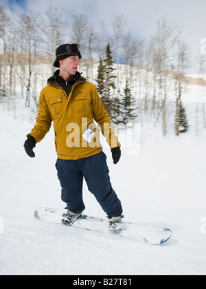 Man snowboarding at the mountains Stock Photo - Alamy