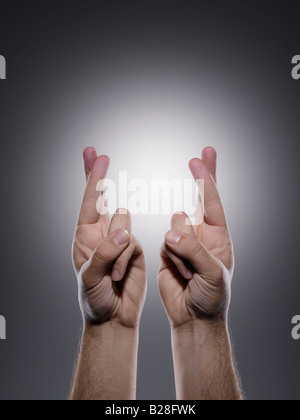 Keep both fingers crossed Stock Photo: 18626959 - Alamy