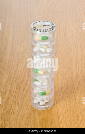 The containers for sorting a daily dose of pills to be taken against a ...