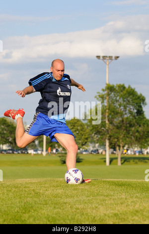 Paramedics carrying an injured football player on a stretcher Stock ...