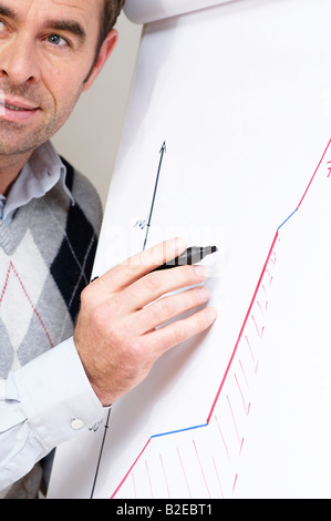 Man giving presentation in lecture hall at university Stock Photo - Alamy