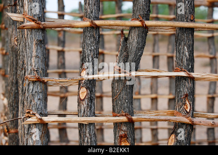 Natural wooden strips tied together with rope which forms the original ...