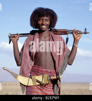 Warriors of the nomadic Afar tribe carry large curved daggers, known as ...