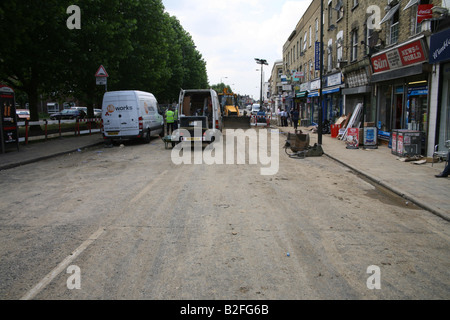 Merton High Street closed after a burst water main Stock Photo - Alamy