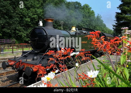 Steam train entering Highley station past the Engine House on the ...
