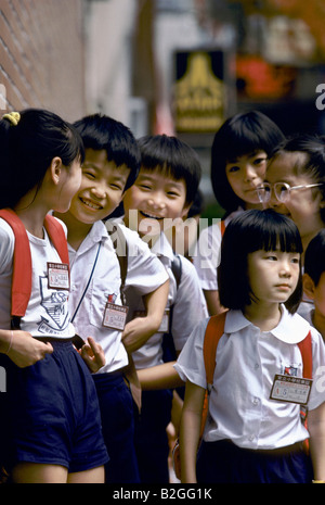 Chinese School Children wear uniform of red neck scarf Stock Photo - Alamy