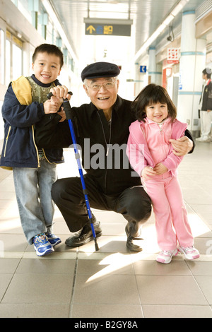 Black man standing at subway platform wearing coronavirus face mask ...