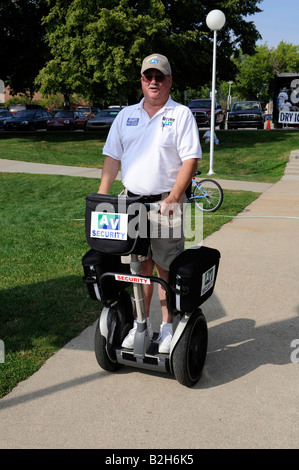 Police Officer on patrol on a Segway PT battery electric vehicle Stock ...