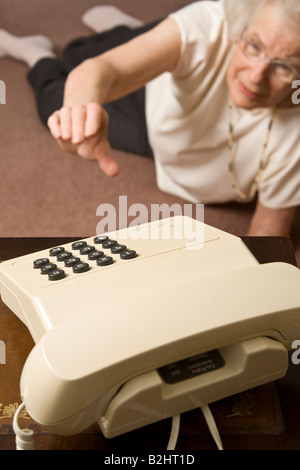 Old woman fallen on the floor, UK Stock Photo - Alamy