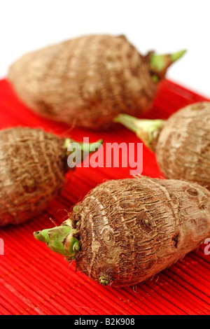 Taro Root of Colocasia esculenta and Organic Taro Flour in a bowl Stock Photo - Alamy
