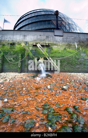 Sewage overflow outlet into the river Thames near City Hall, London ...