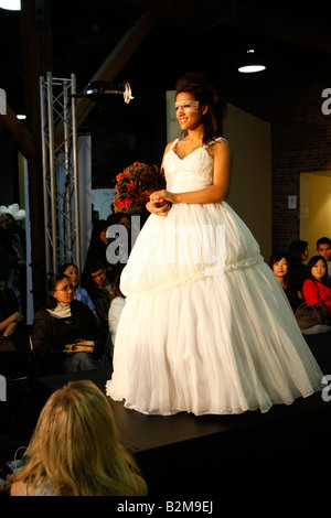 female modeling at a fashion show for wedding dresses Stock Photo - Alamy
