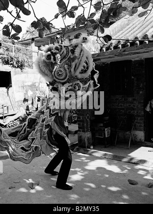 Lion dance first footing at Chinese New Year Stanley Village Hong Kong ...