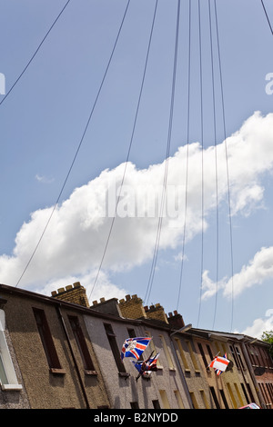 Unionist flags fly from windows of terraced houses in the Waterside ...