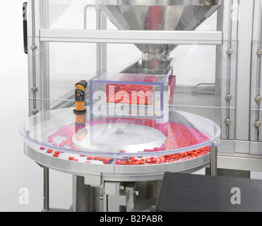 pharmaceutical industry, medicine pills are filling in the plastic ...