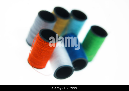 different colored thread for sowing Stock Photo - Alamy