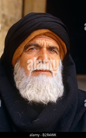 portrait of elderly Lebanese man with gray mustache and goatee wearing ...